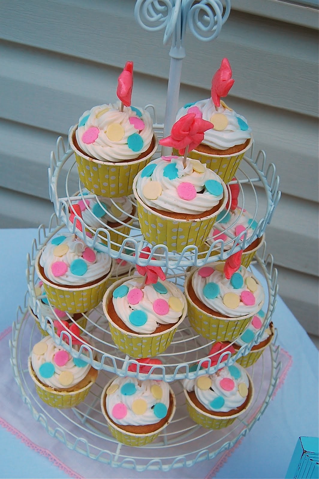 These adorable yellow and white cupcake holders were donated by ...