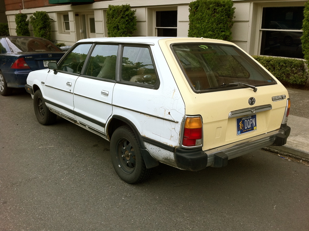 OLD PARKED CARS.: 1980 Subaru DL Wagon.