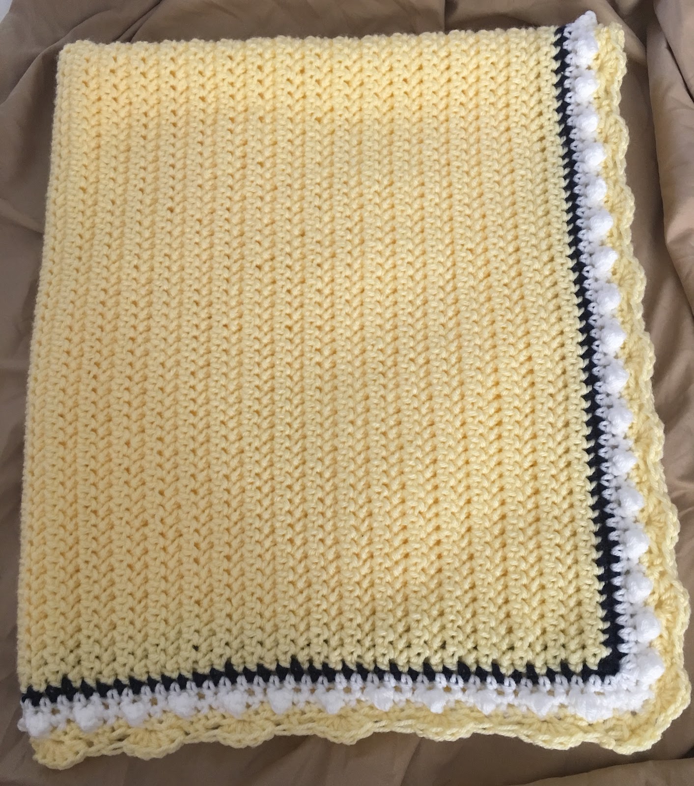 The Perfect Stitch...: Buttercup Michelin Baby Blanket with Bib Logo