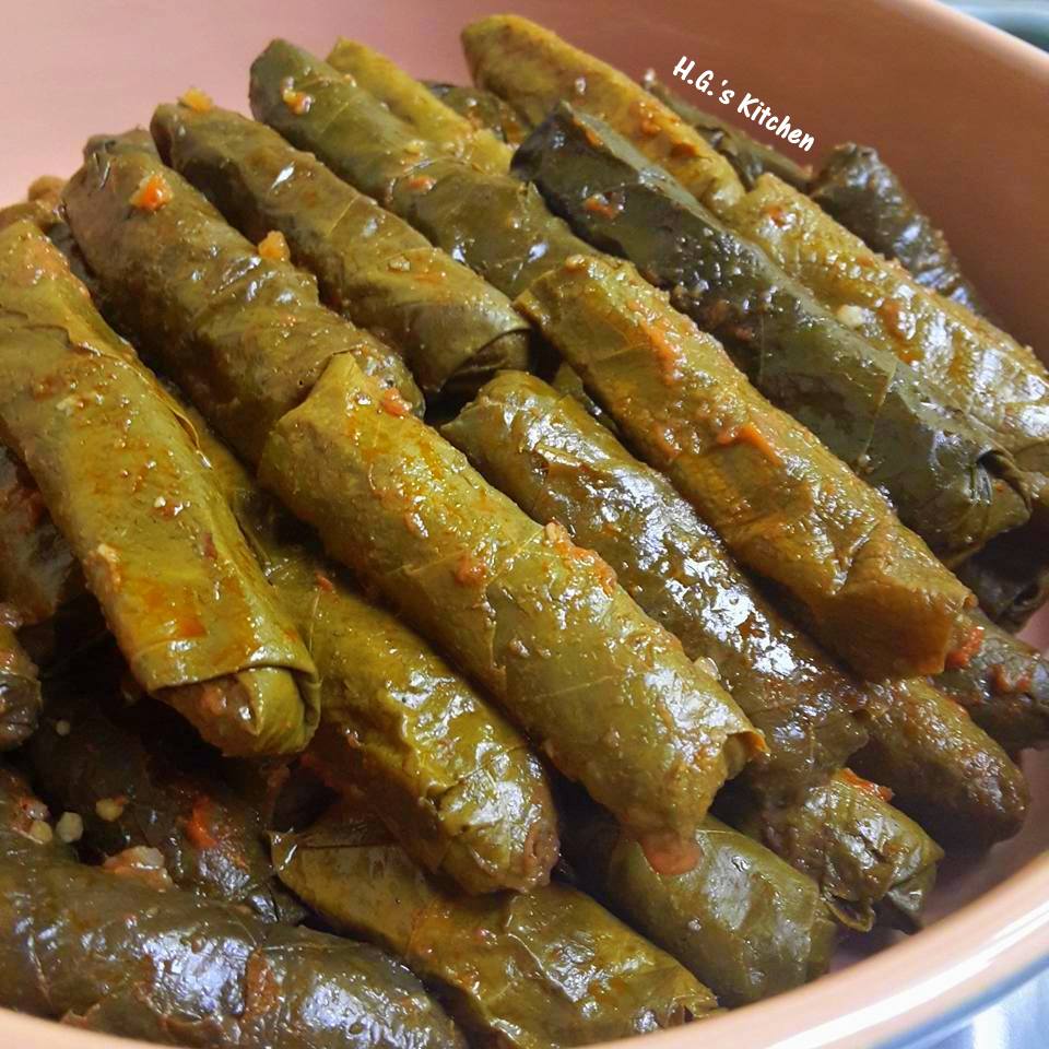 SARMA (traditional Turkish stuffed vine leaves with meat and bulgur ...