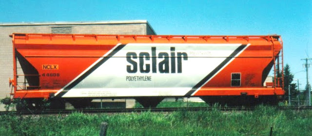 Trackside Treasure: DuPont SCLAIR Covered Hoppers