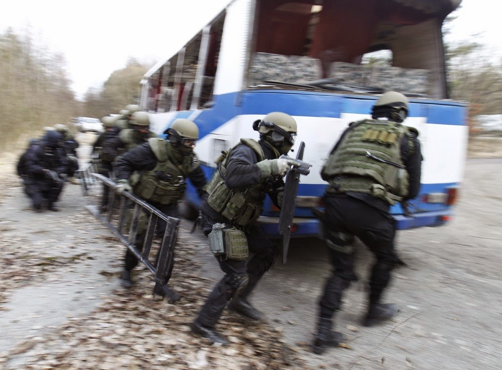 Polish SWAT team participate in a drill at a military training ground ...