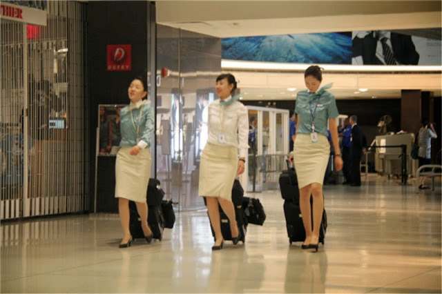 Korean Air stewardesses after cabin service
