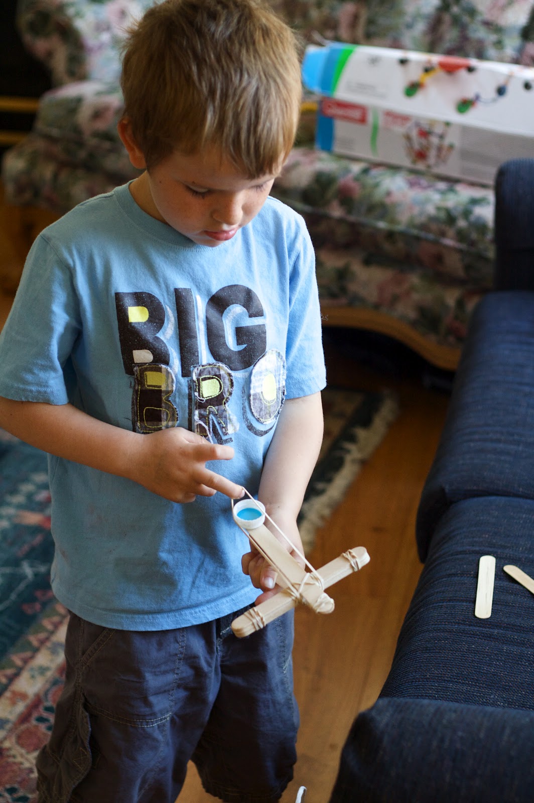 {create} popsicle stick launchers