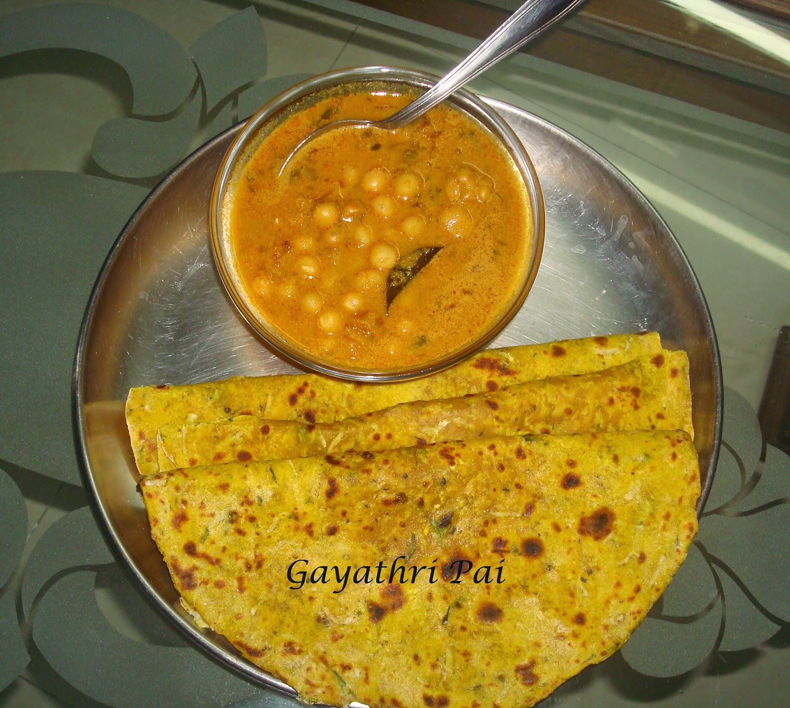 Gayathri Pai's Food Bytes: White Vatana Curry with Radish Paratha.