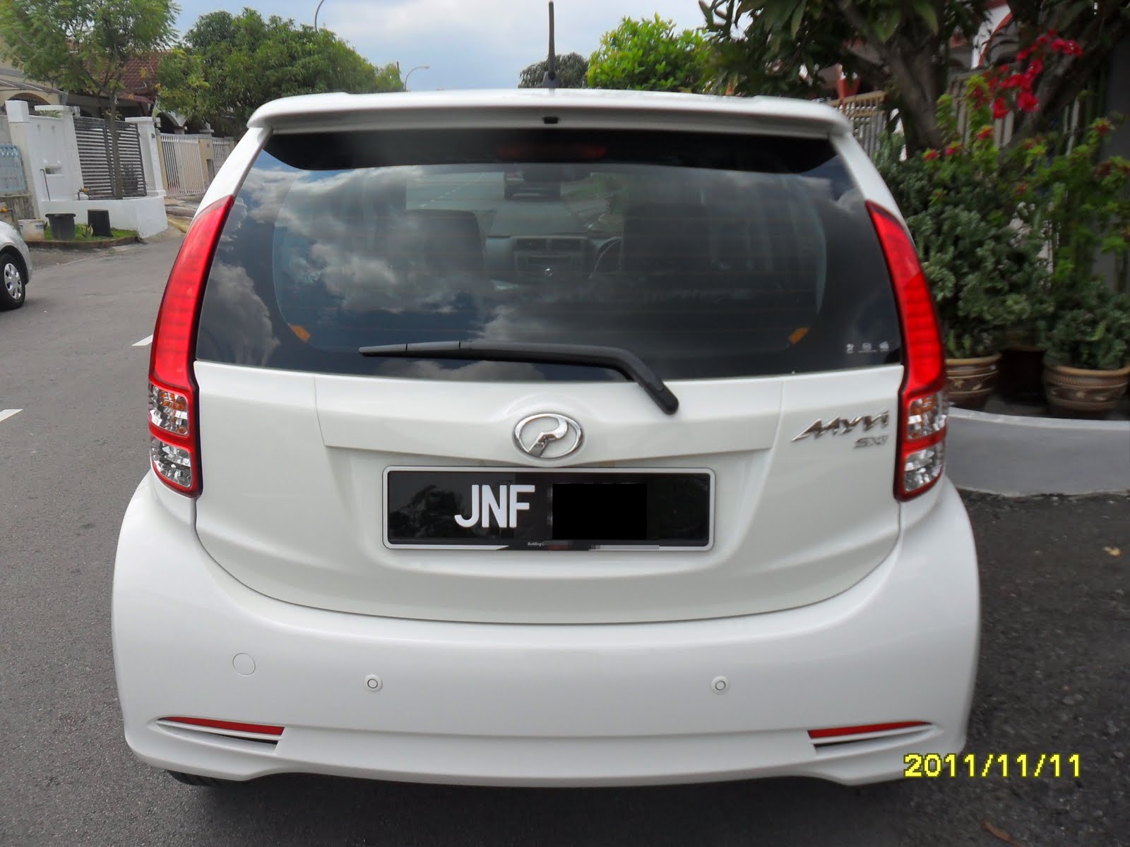 Mizz Yana: My new car Ivory White Myvi ;D