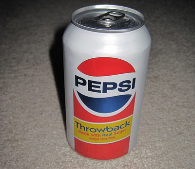 the cereal box: Nos Shock! Pepsi brought back there old cans