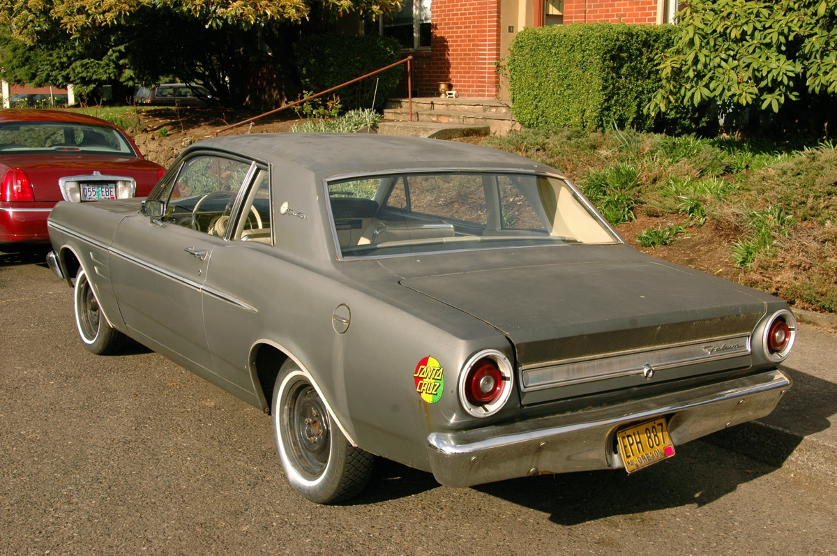 OLD PARKED CARS.: 1967 Ford Falcon Futura Sports Coupe.