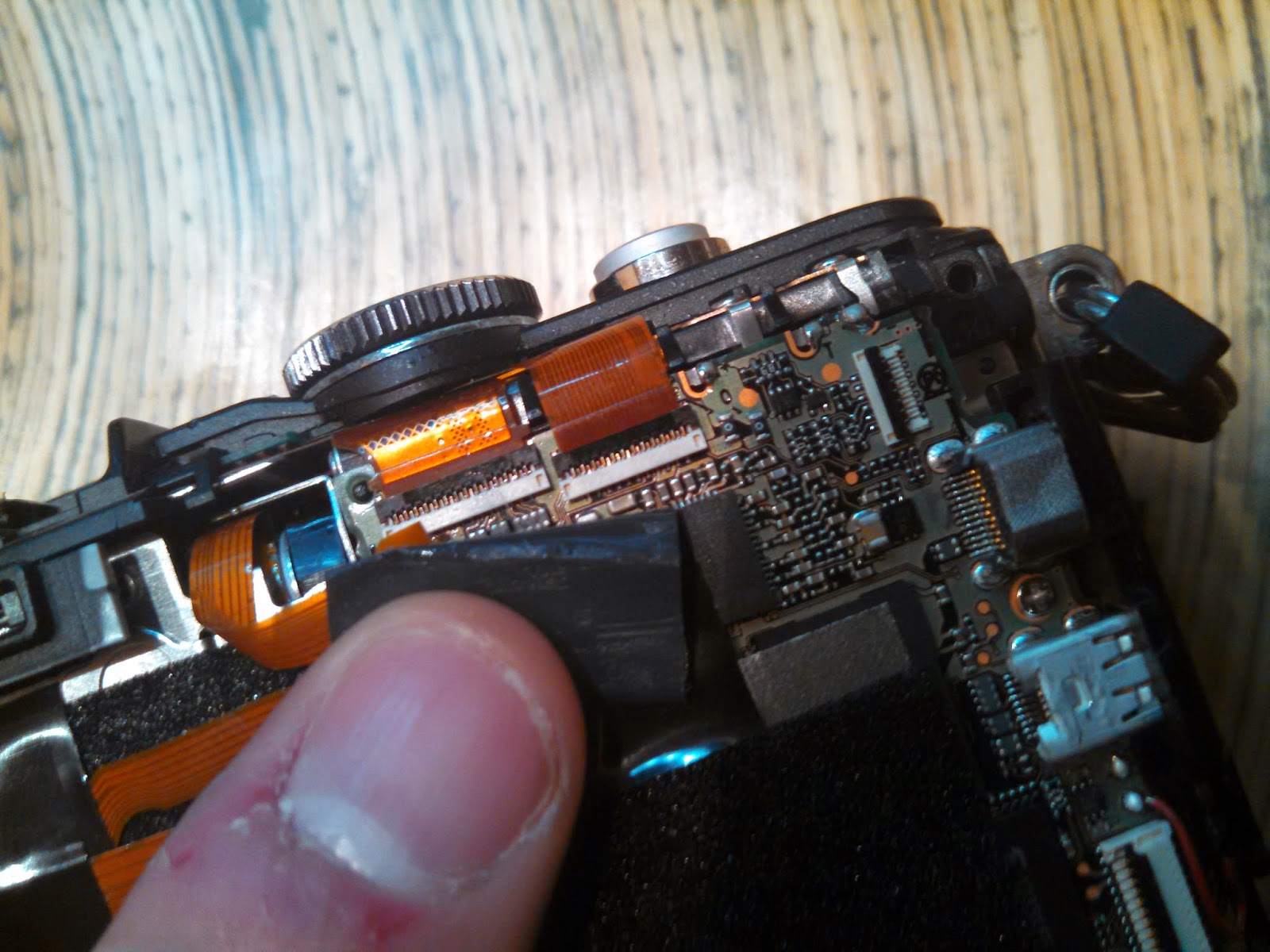 Olympus pen lite (e-pl5) Shutter button teardown ~ A travelling fool