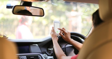 TM's Blog: How to use your phone while driving.
