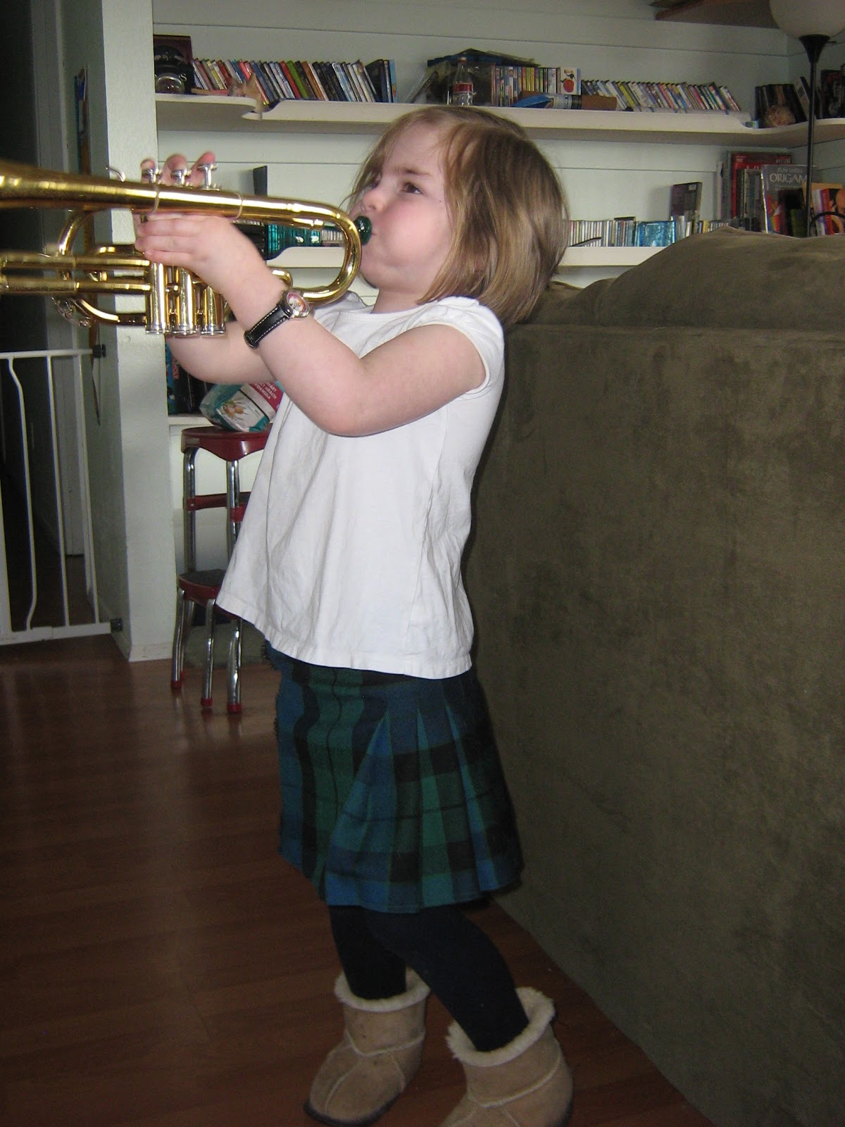 An Alaskan Odyssey: a cute kilted kid playing cornet