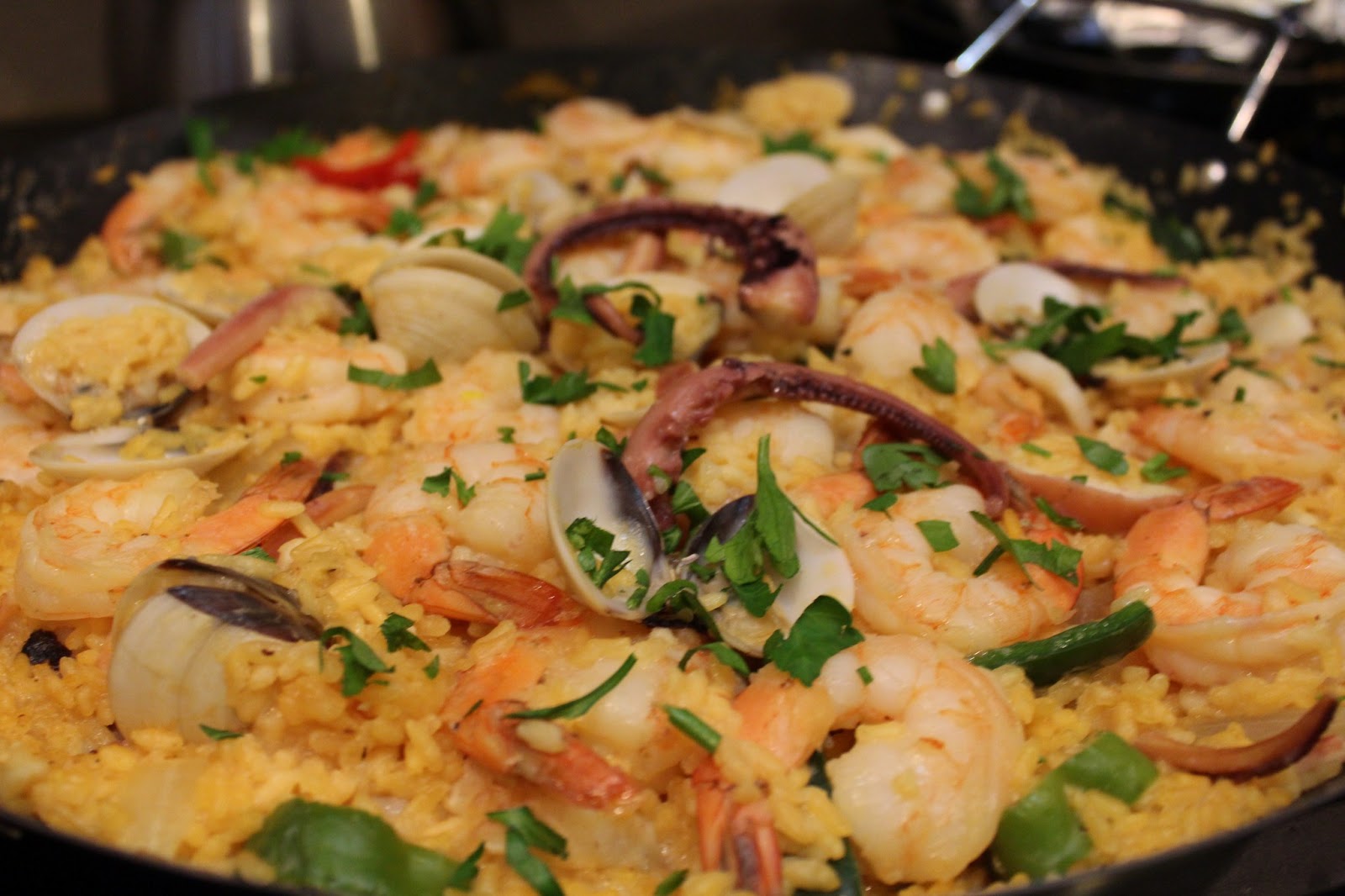 FLOWER POT KITCHEN: SEAFOOD PAELLA WITH FRESH CLAMS, PRAWNS AND OCTOPUS