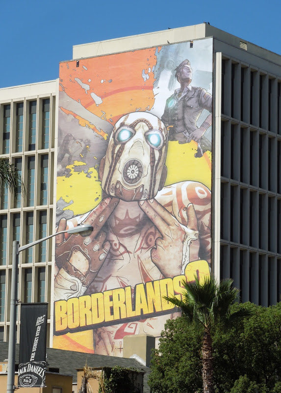 bridesmaids movie: Giant Borderlands 2 video game billboards...