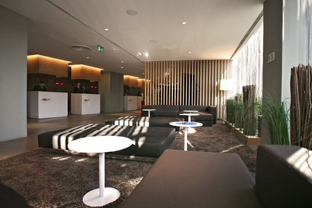 Lobby del Hotel Radisson por Tanju Özelgin