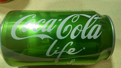 Coca Cola Life. La etiqueta verde de Coca Cola : Consume Calidad