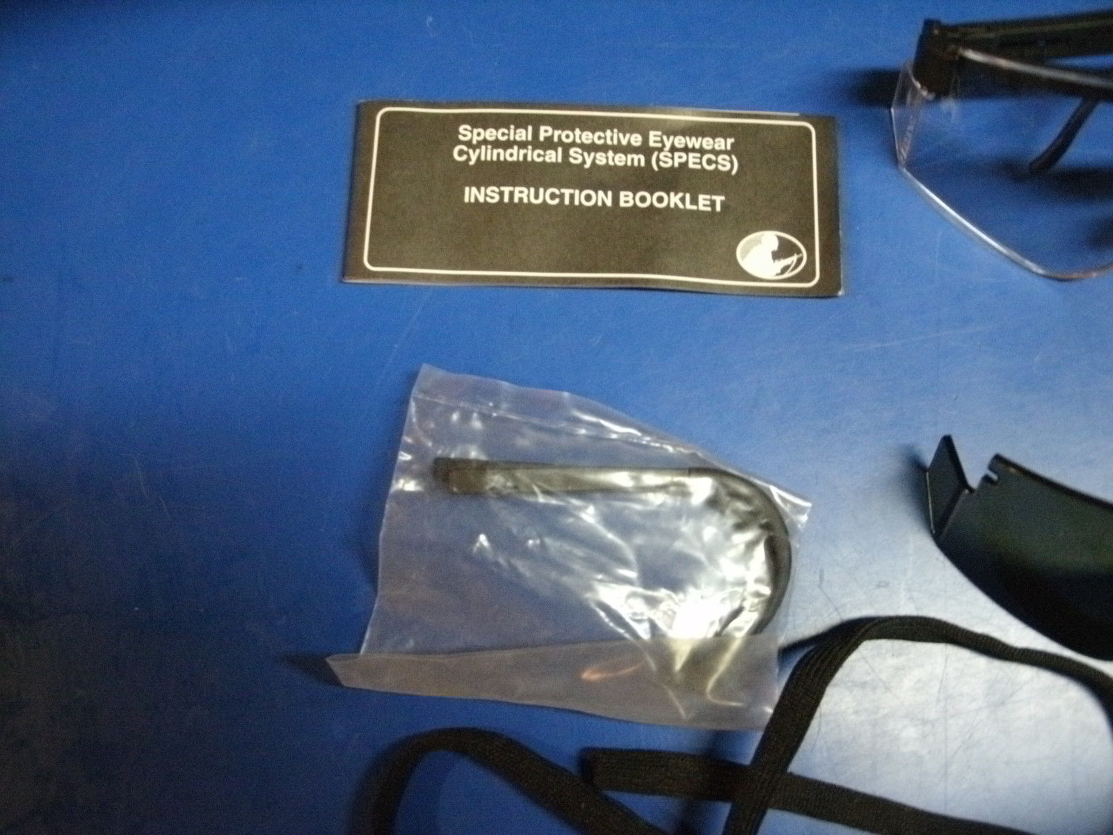 Webbingbabel: Special Protective Eyewear Cylindrical System (SPECS)