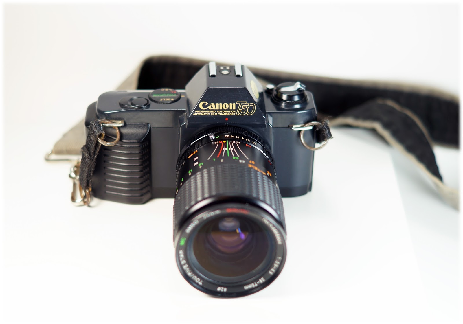 Canon T50 SLR film camera with Tou/Five Star 28-75mm Lens