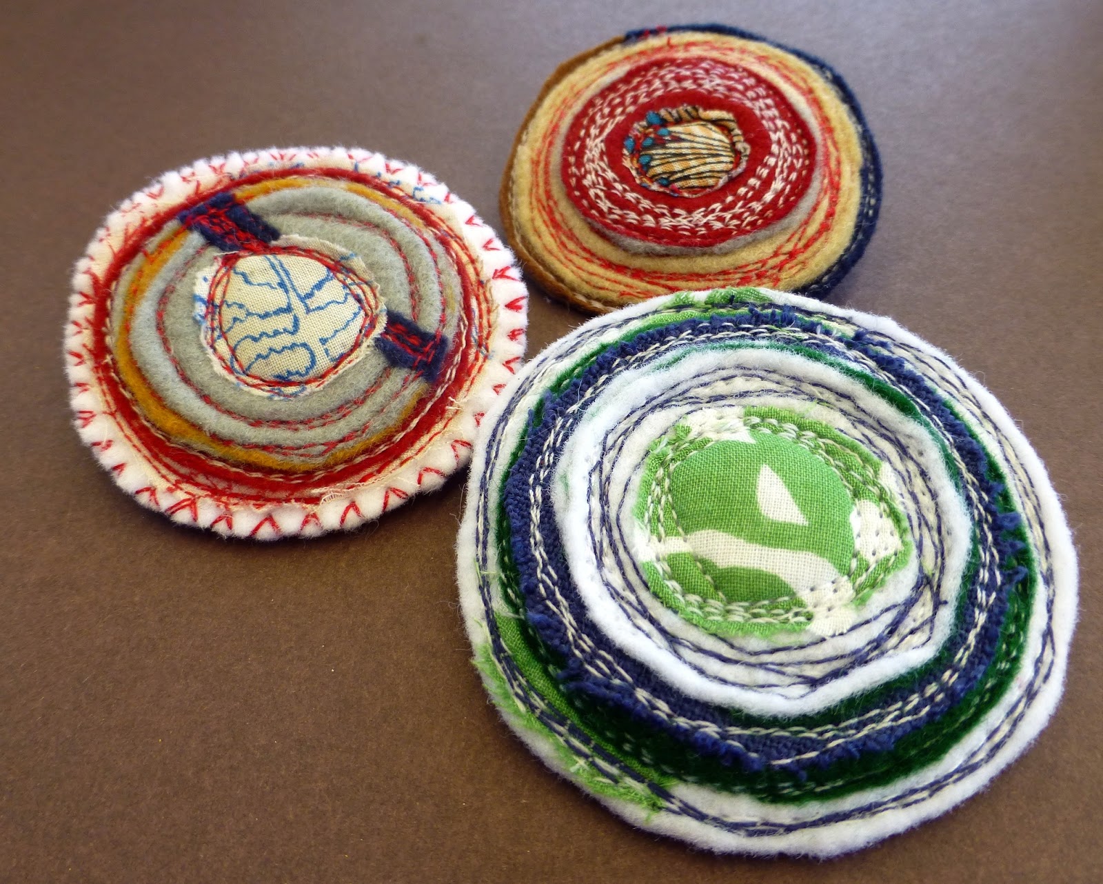 eclectic me: fabric & felt collage brooches...