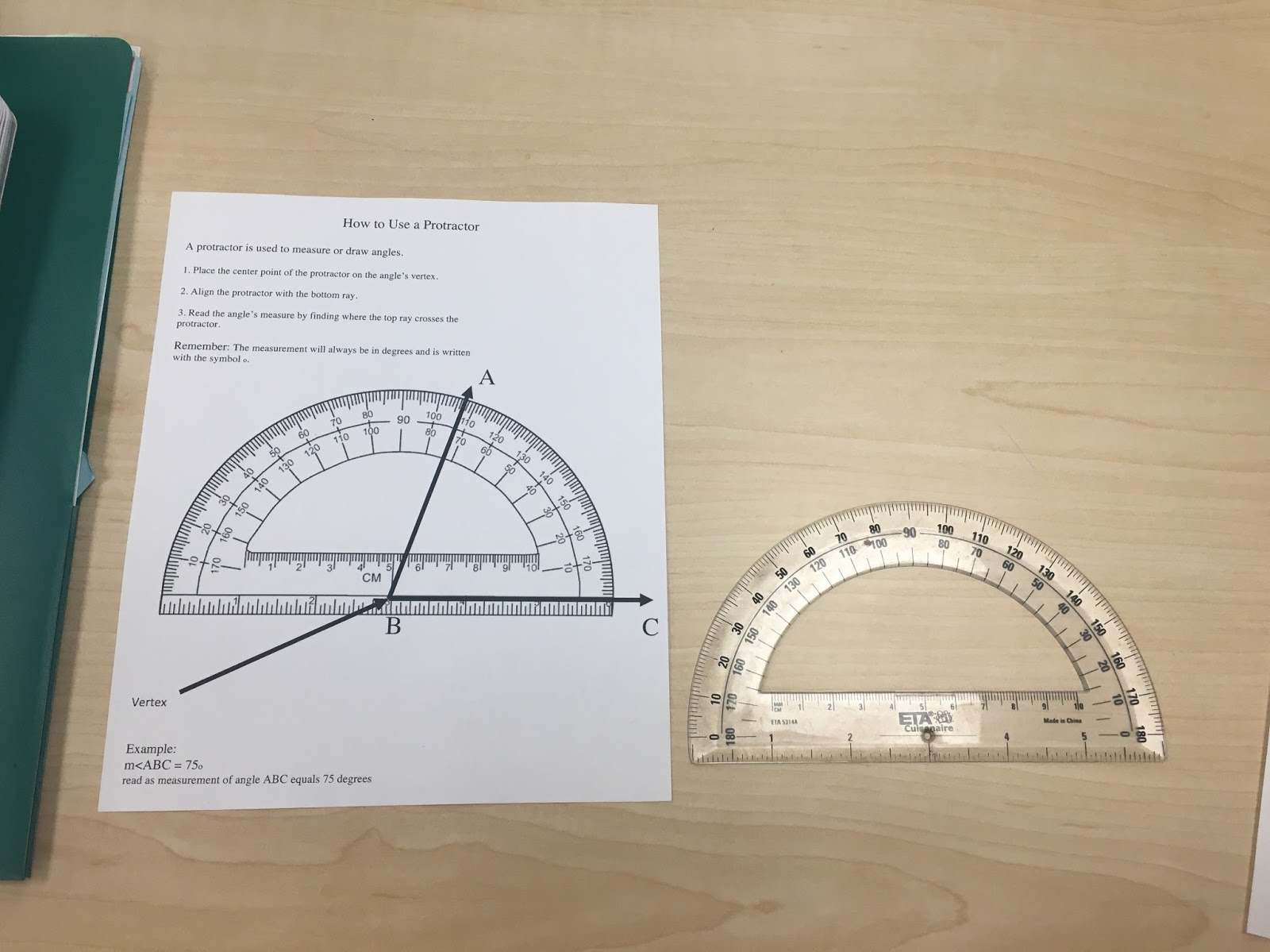 The Math Experience: Protractor or Compass?