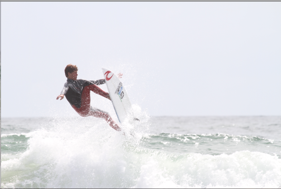 Surf City: Jack Brandon performing a surfing aerial maneuver.