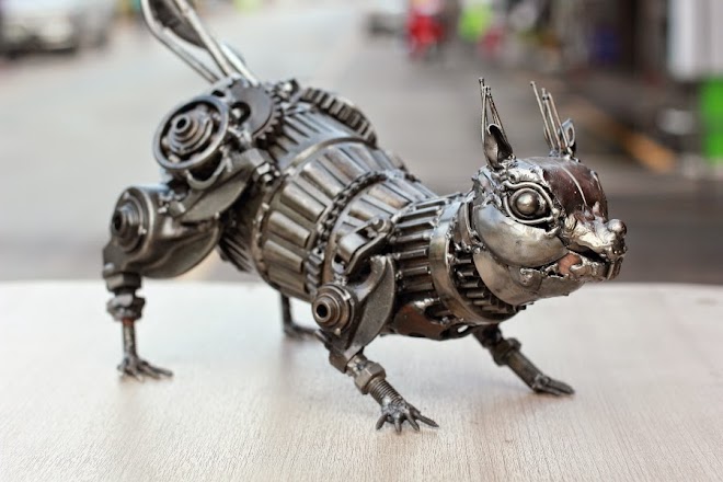 Rabbit standing scrap metal sculpture, steam punk