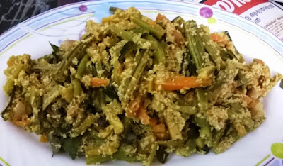 Avial - Vegetables cooked and mixed with grated coconut garnished with ...