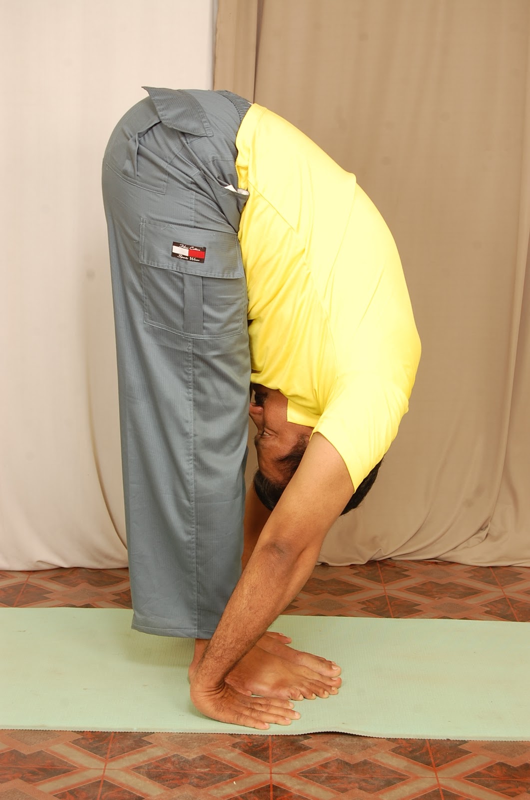 Body and Soul: Standing Forward Bend And Its Benefits