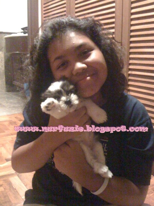 Nanu Baharuddin dan haiwan peliharaannya seekor puppy