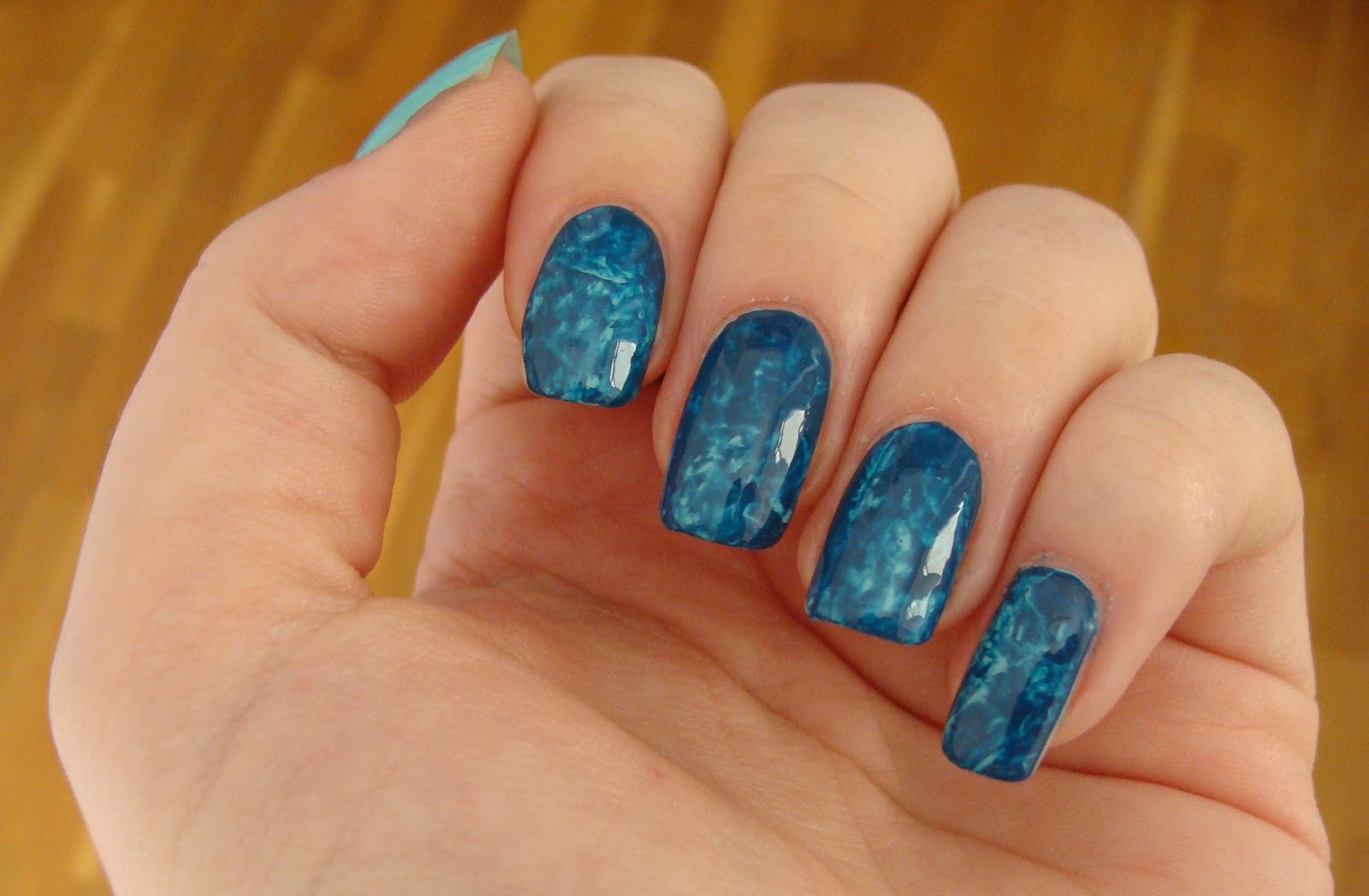 Criminal Nails: Swimming pool nails - Saran Wrap manicure