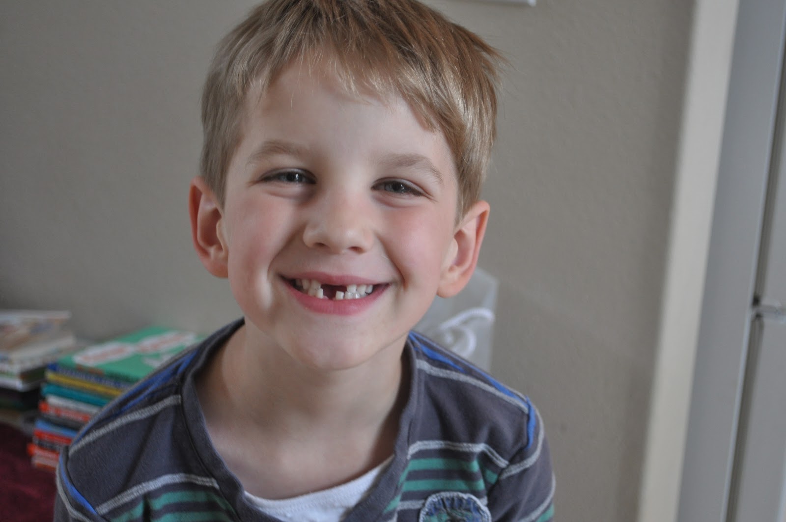 Lovin' on my boys... and sweet girl!: Gavin's first loose tooth!!