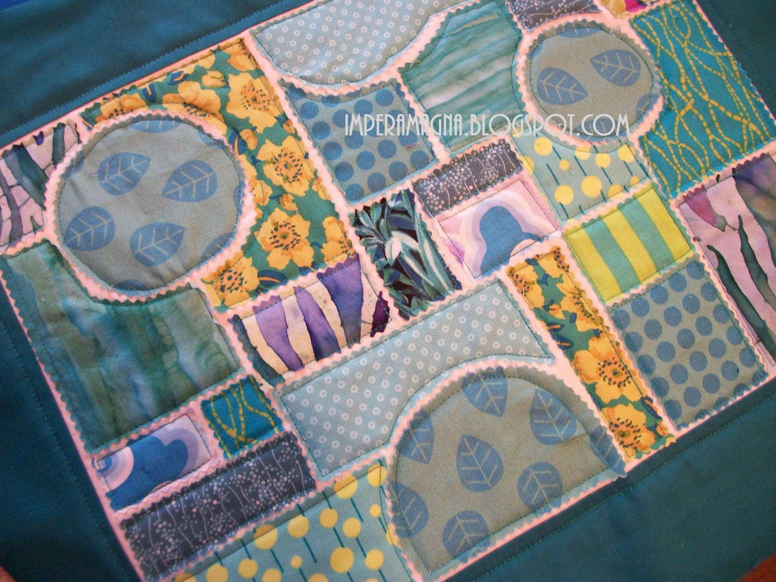 The Adventures of the Empress of the Universe: Assembling QAYG Blocks