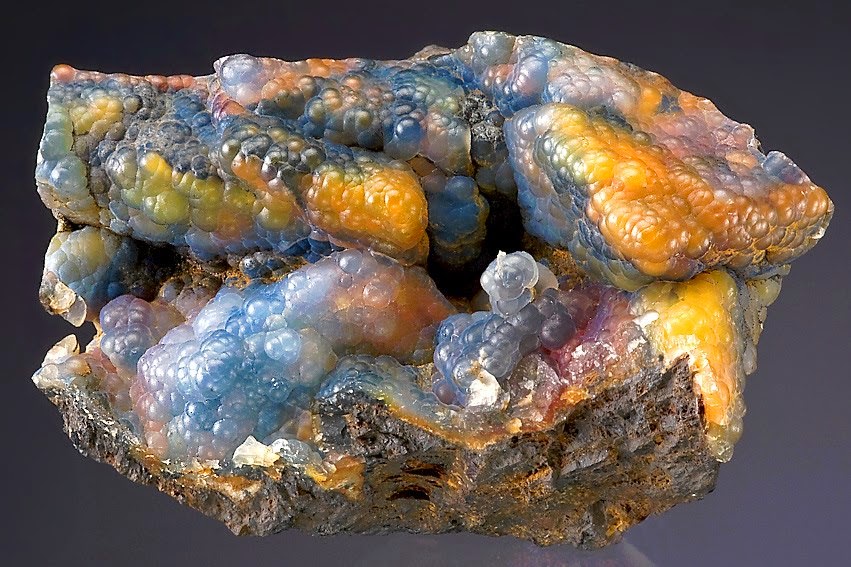 Chalcedony over multi-colored Smithsonite | Geology In