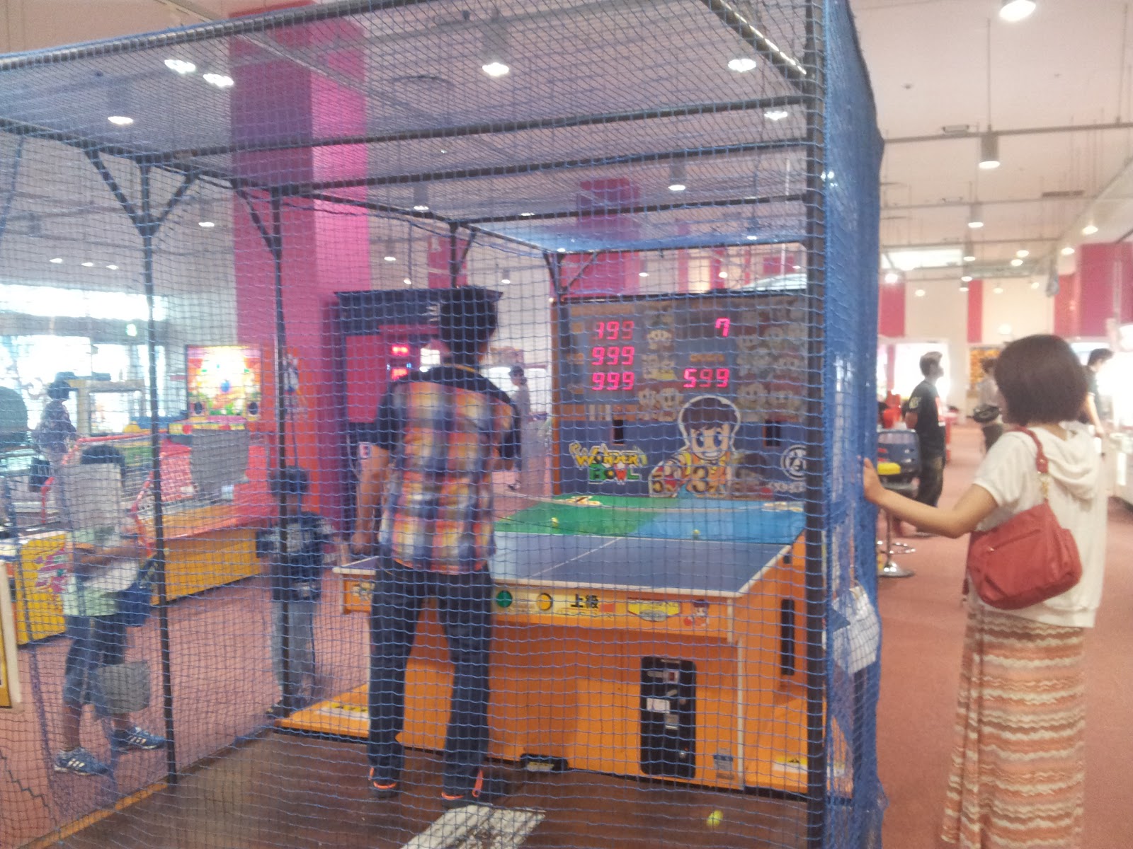 Looking for info on a Japanese ping pong arcade game that shoots balls ...