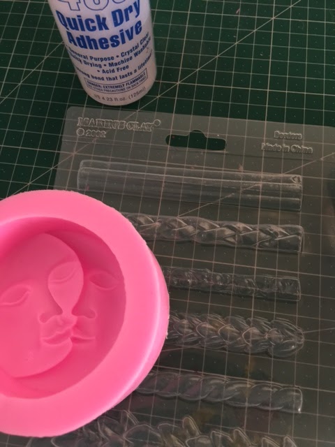 Faces of the Moon Mixed-Media Display by Lucy Reese