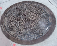 Walking Seattle Neighborhoods: Manhole Cover Art