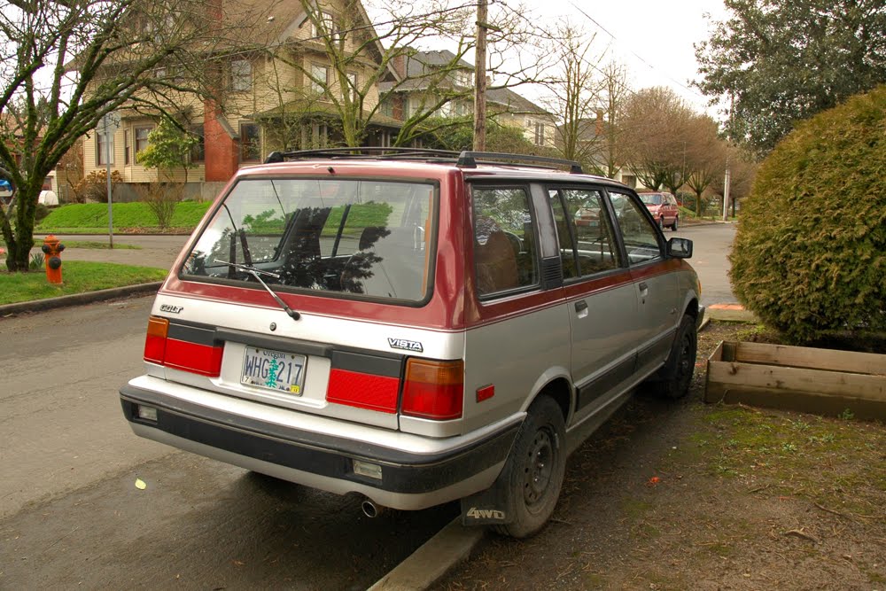 OLD PARKED CARS.: 1991 Imported for Plymouth Colt Vista.