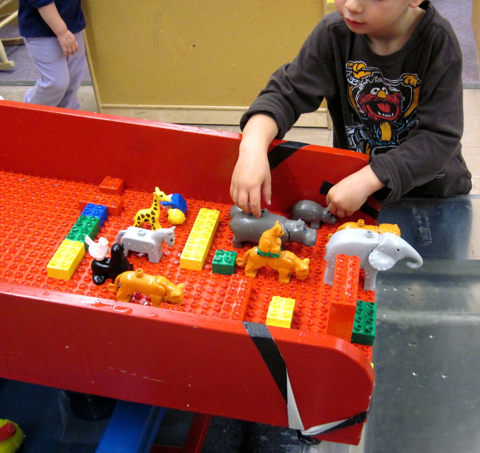 SAND AND WATER TABLES: DUPLO BOARD RAMP