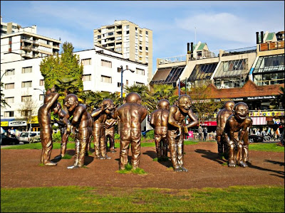 The Traveller: Totem Poles and Laughing Statues at Vancouver British ...
