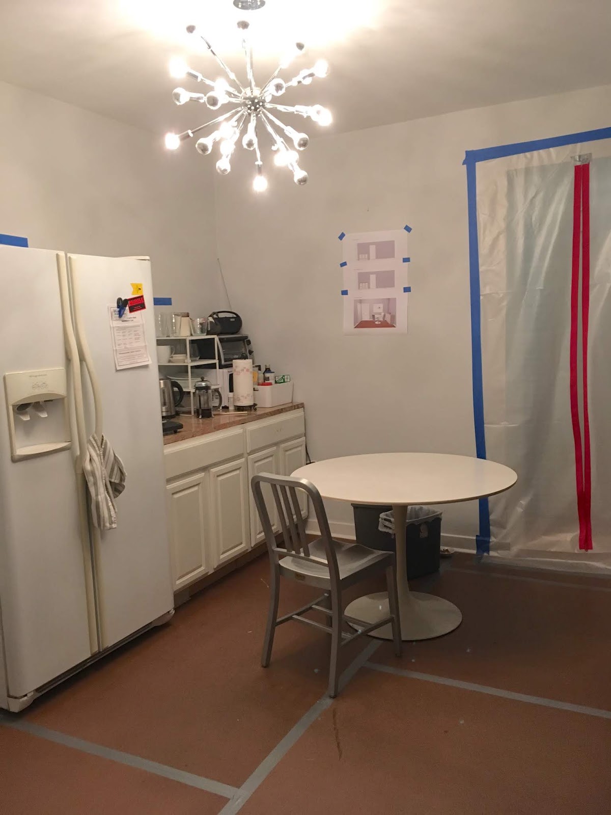 There was a plastic zip door separating the “job site” from our ...