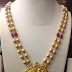 Jewellery Designs : #@ Pearl Ruby mala with Desinger locket