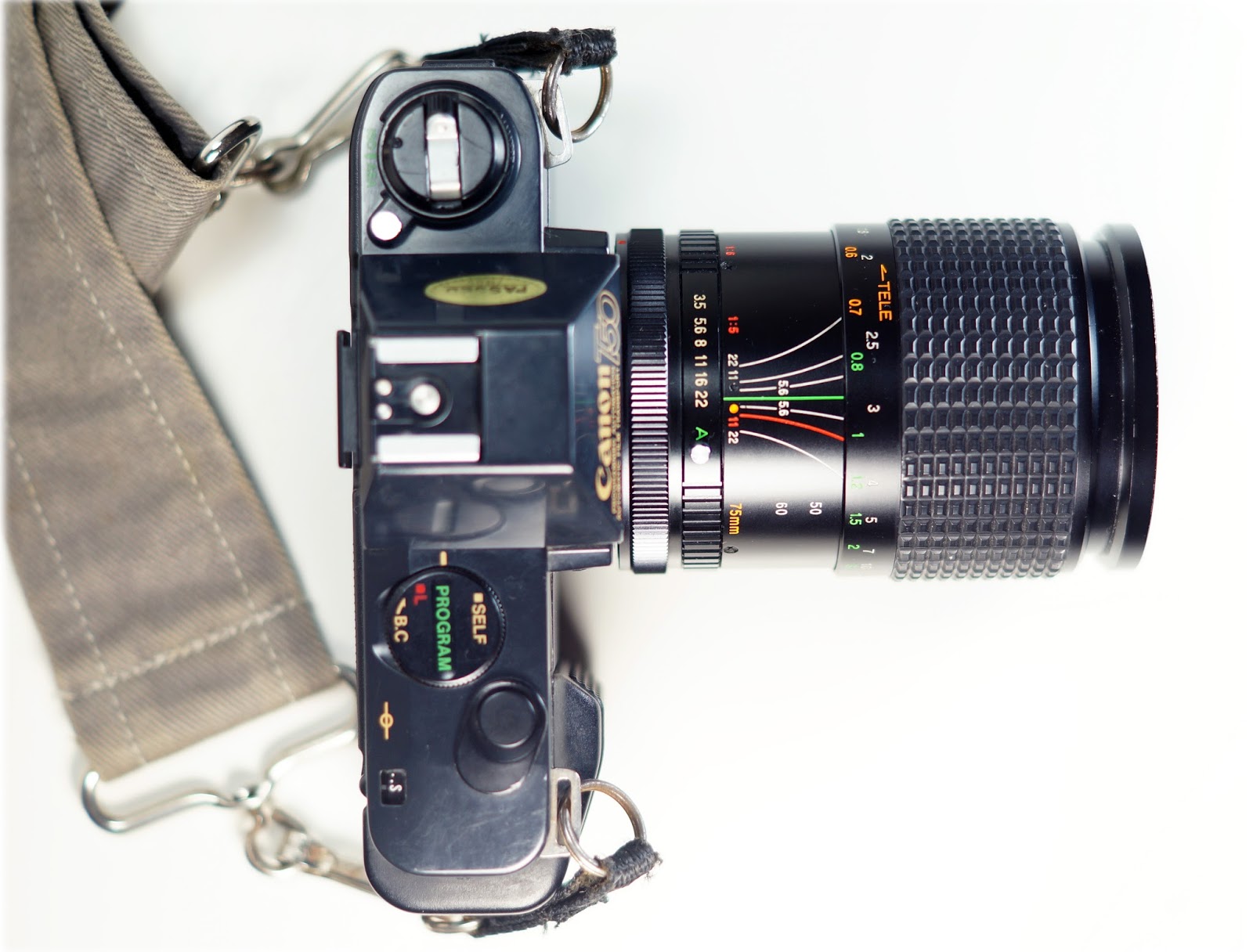 Canon T50 SLR film camera with Tou/Five Star 28-75mm Lens