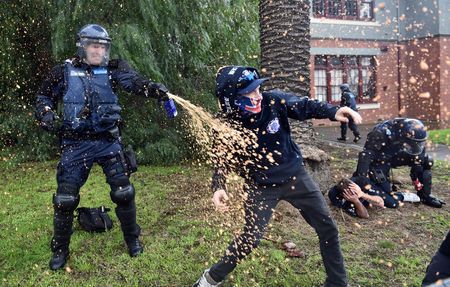 Australia police use pepper spray as nationalists clash with anti ...