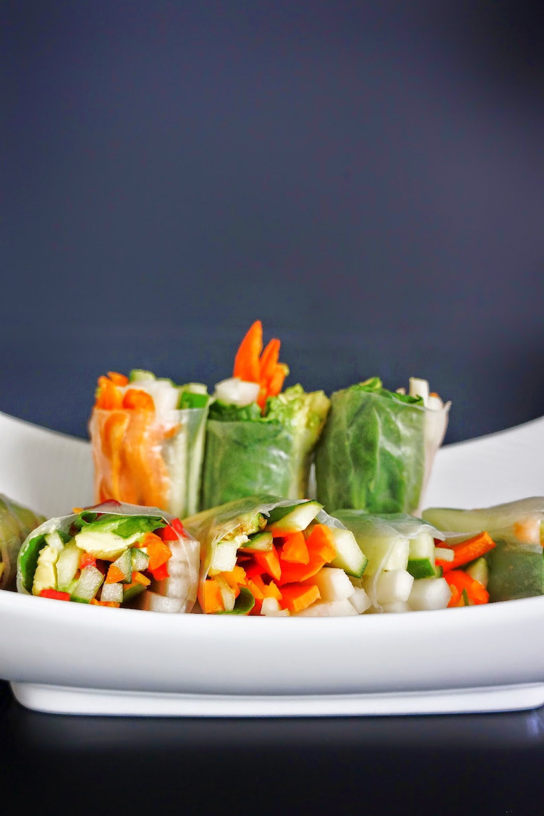 Raw vegan spring rolls with peanut butter dip