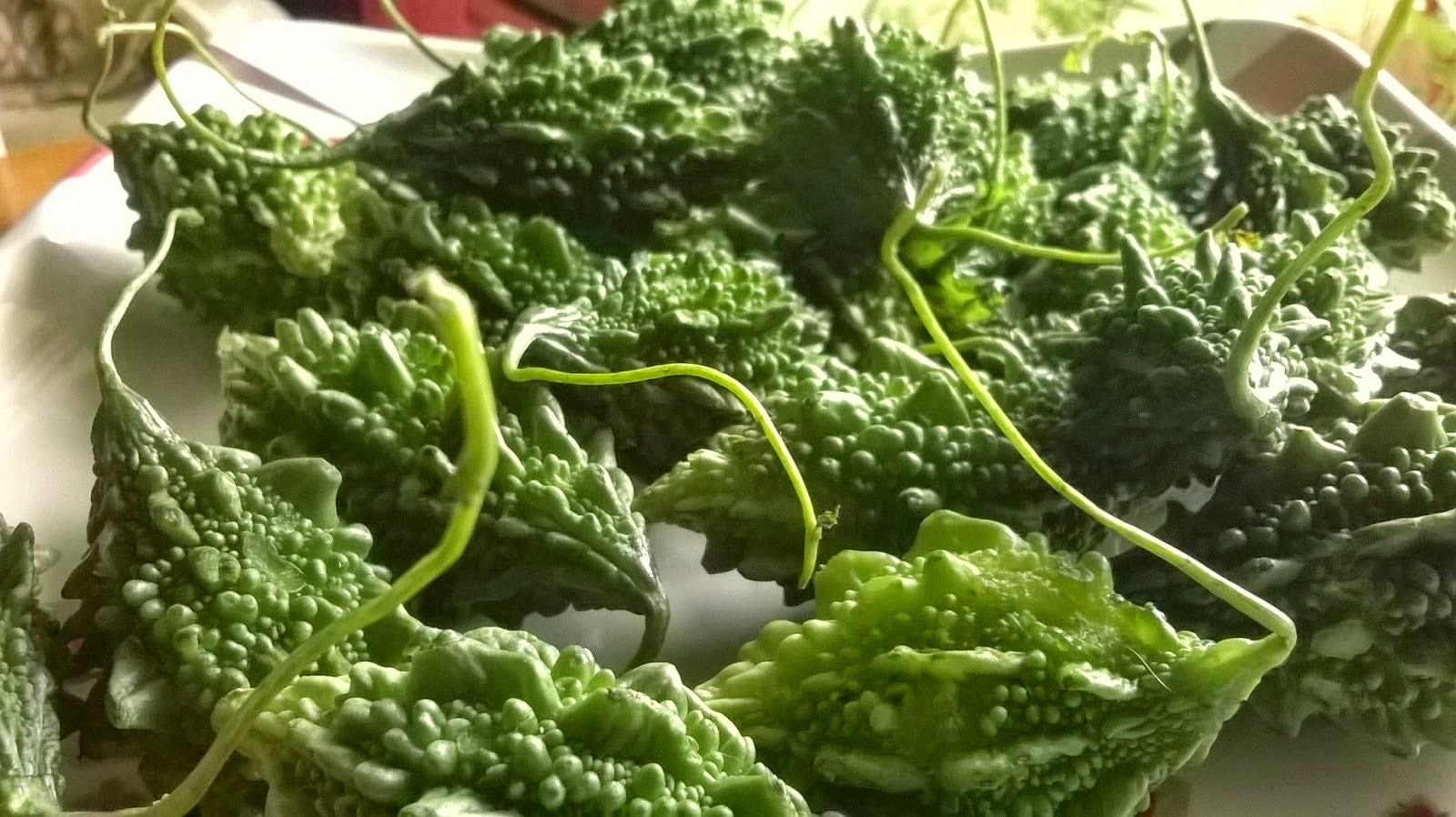 Pavakka Theeyal (Bitter Gourd and shallots cooked in spicy roasted ...