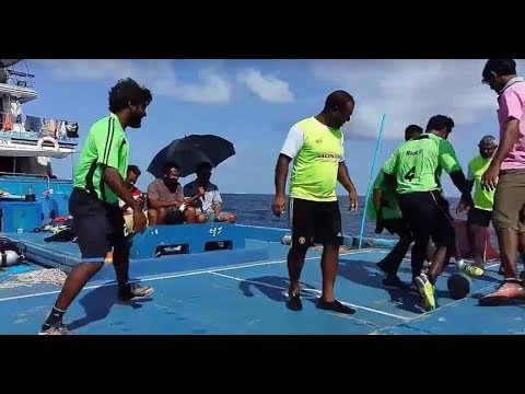 Playing football in the Fishing Boat - The Logical Maldivian
