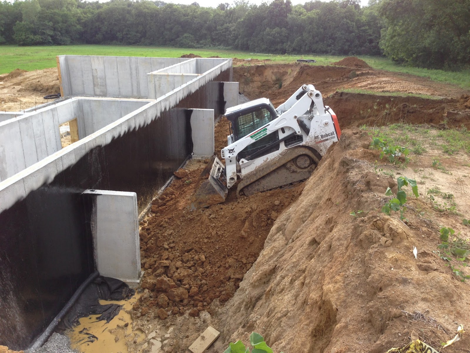 Building Beyeler Hollow: Day 69: Foundation Water-proofed and Backfill ...