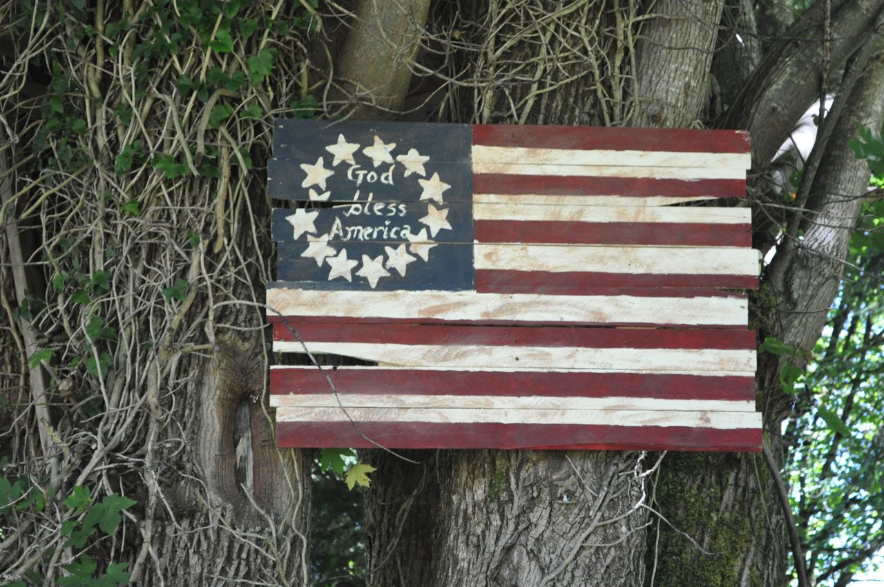 Homemade wood Flag - Sisters, What!