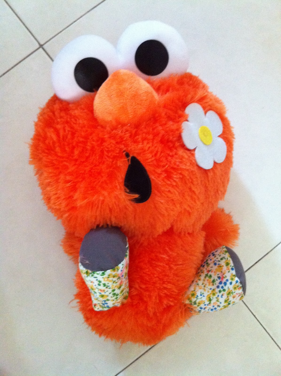 CatchUp Plush: Elmo : Orange Elmo with Flower ~ $20 (#CU-025)