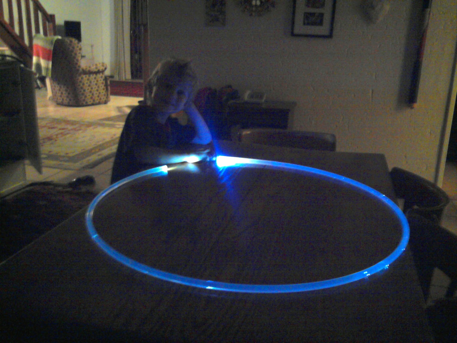 (+ 1 1): Transmitting light, via liquid, down a plastic tube