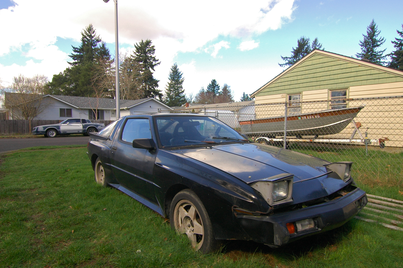OLD PARKED CARS.: 1987 Mitsubishi Starion ESI-R.